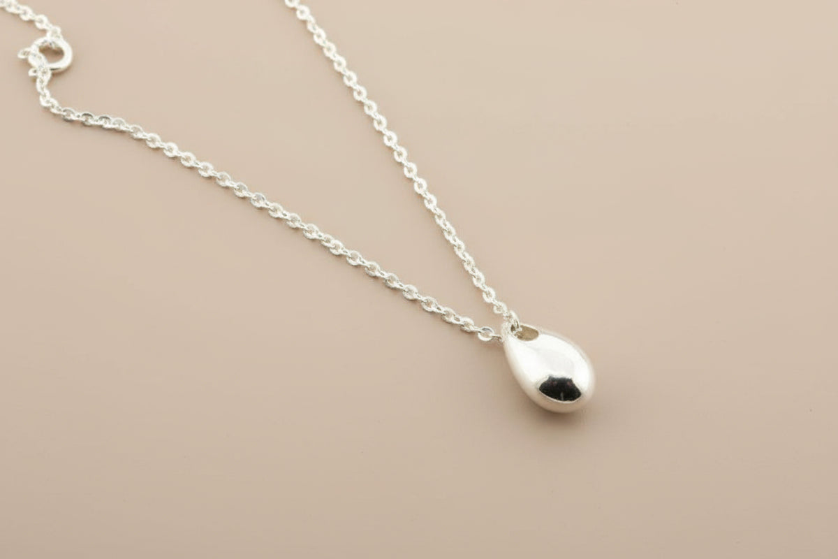 Silver teardrop pendant on silver chain – Makers & Providers